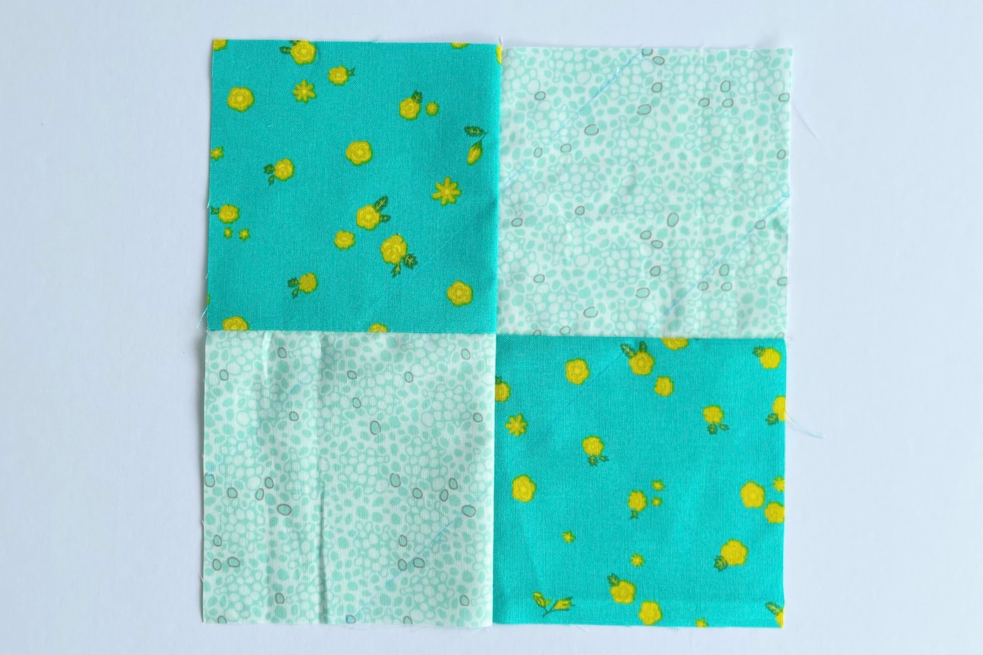 Diagonal Cut Disappearing 4 Patch Quilt Block Tutorial | Polka Dot Chair